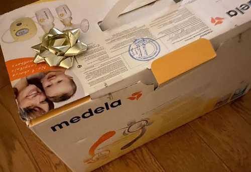 Молокоотсос электрический двойной medela