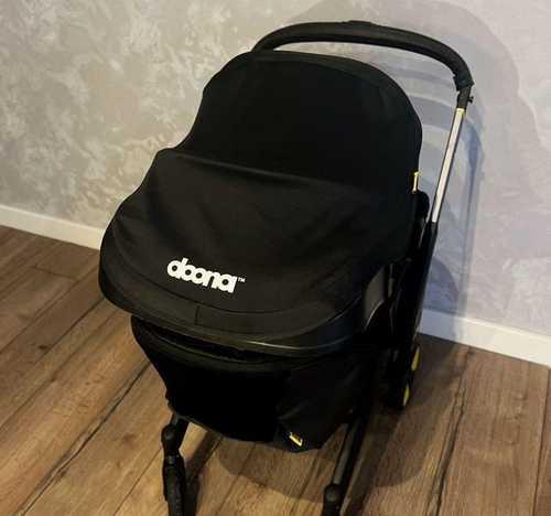 Коляска автокресло doona plus