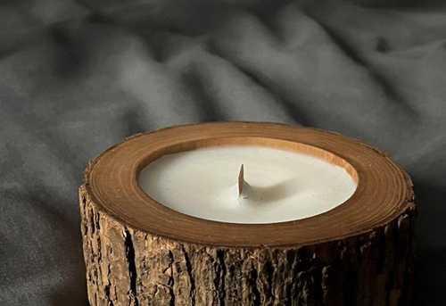 Свеча в спиле дерева