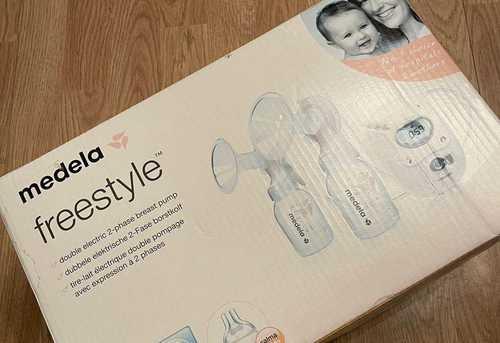 Молокоотсос электрический medela Freestyle double