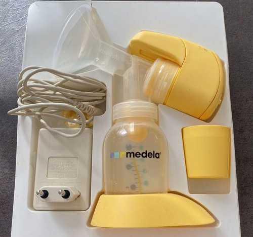 Молокоотсос medela электрический mini electric