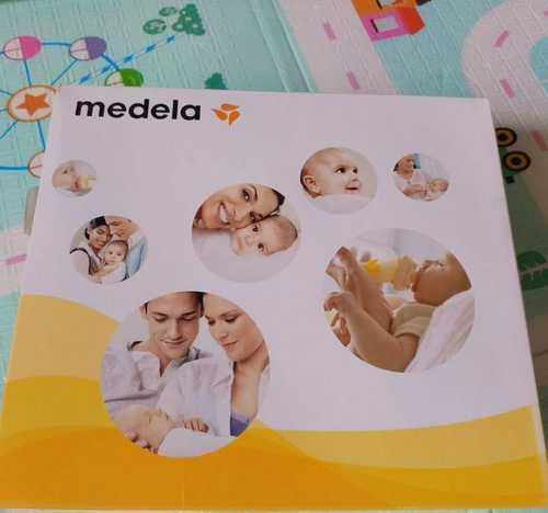 Молокоотсос medela электрический новый