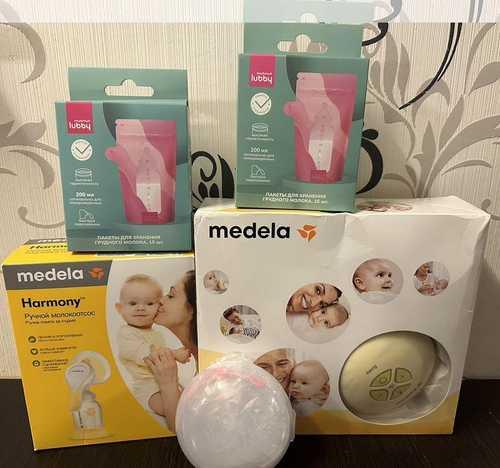 Молокоотсос medela электрический   harmony ручной