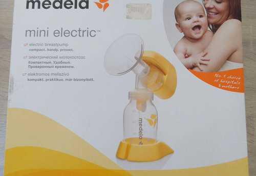 Молокоотсос medela электрический