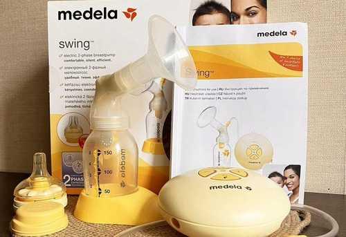 Молокоотсос medela swing электрический