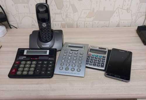 Радиотелефон, смартфон,3 калькулятора