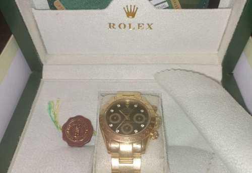 Золотые часы Rolex Daytona