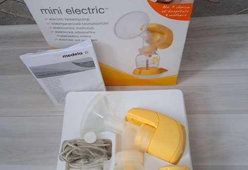 Молокоотсос medela mini electric электрический