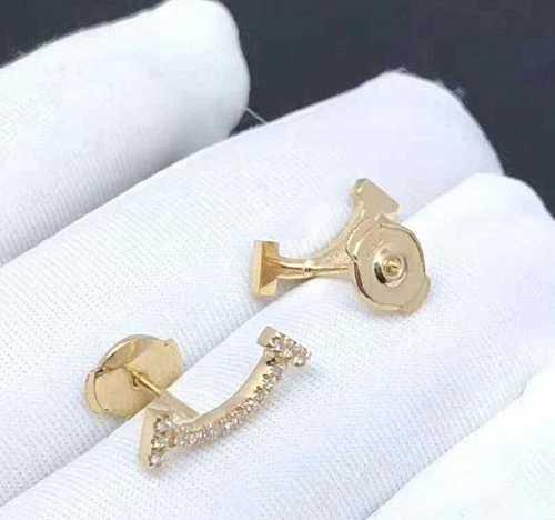 Серьги-гвоздики Tiffany T Smile 0,06 ct