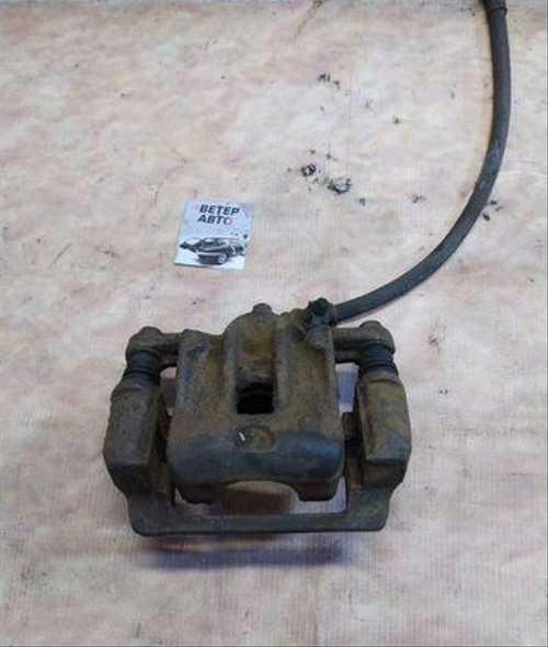 Суппорт задний левый Kia Sportage 2