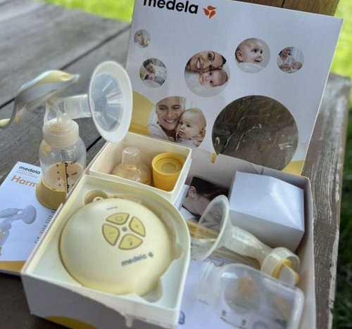 Молокоотсос medela электрический