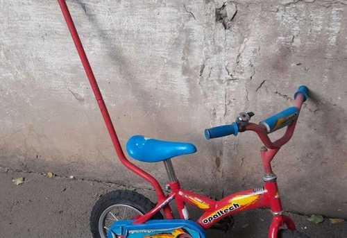 Детский велосипед с ручкой колеса 12