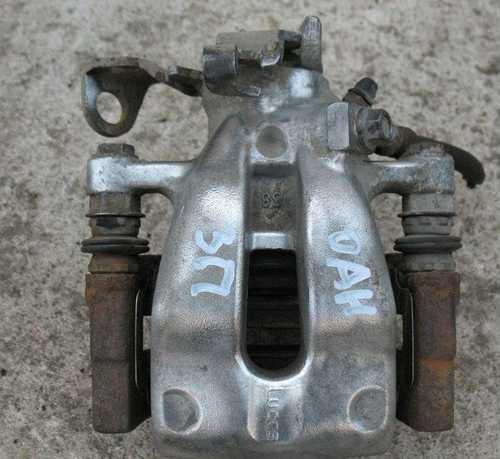 Правый задний суппорт Opel Astra H, Zafira B
