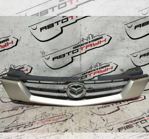 Решетка радиатора mazda demio DW3W DW5W полоски 2 модель D26750710A09 QA4723Z