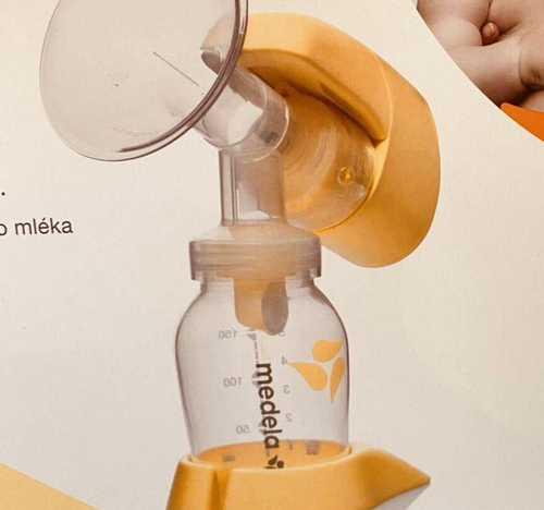 Молокоотсос medela электрический