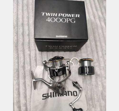 Катушка shimano 15 twin power 4000 pg