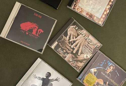 CD диски фирменные Prince Bryan Adams Brian May