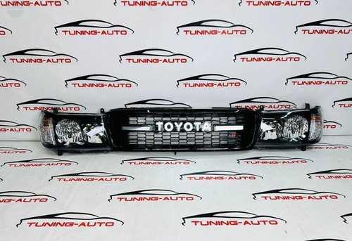 Фары (темные) с решеткой Toyota Land Cruiser 100