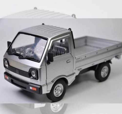 Модель авто Suzuki Carry Truck 1982 пикап 1:18 мет