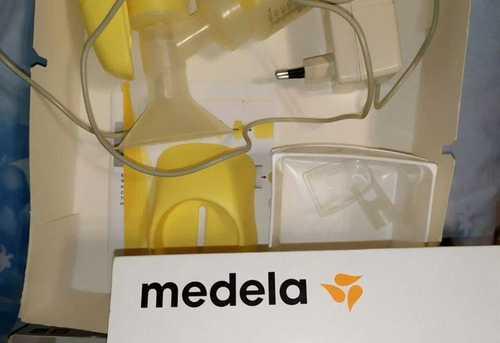 Молокоотсос medela mini electric