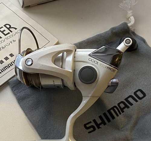 Катушка рыболовная Shimano Biomaster 1000 в чехле