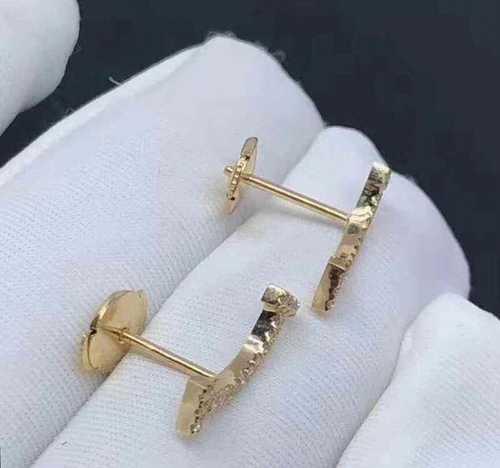 Серьги-гвоздики Tiffany T Smile 0,06 ct