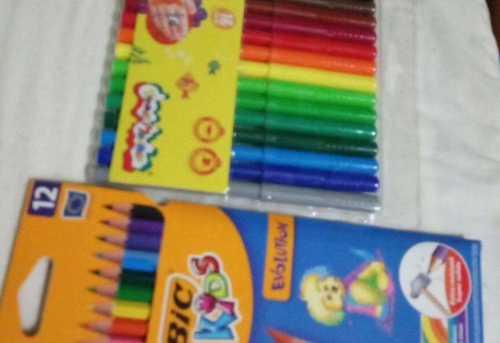 Набор цветных карандашей и набор фломастеров