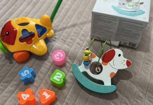 Игрушки каталки пакетом для малыша