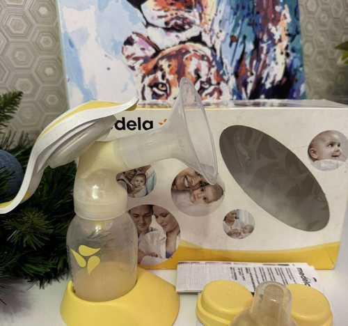 Молокоотсос medela ручной