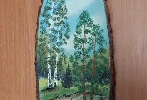 Картина из камней на срезе дерева