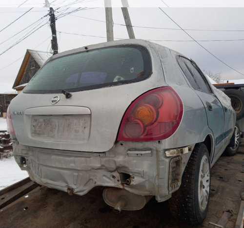 Фонарь задний на nissan almera n16 хетч