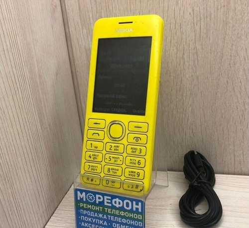 С) Телефон Nokia 206