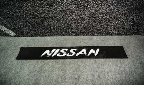 Наклейка на лобовое стекло 140х20 Nissan