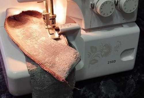 Швейная машина оверлок Janome 210d