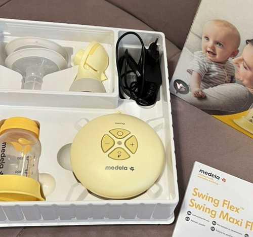 Молокоотсос электрический medela swing flex