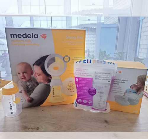 Молокоотсос medela Swing Flex электрический