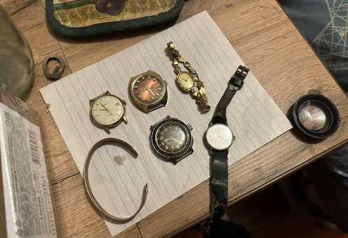 Часы и браслеты позолоченные