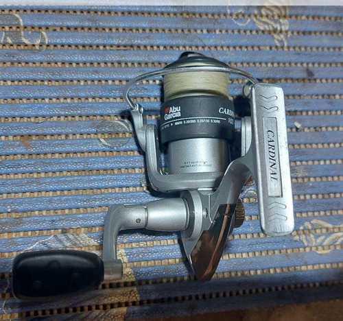 Катушка рыболовная daiwa и Abu garcia