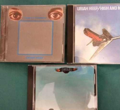 Компакт диски Eagles и Uriah Heep