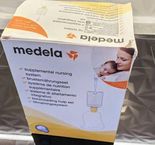 Дополнительная система кормления medela