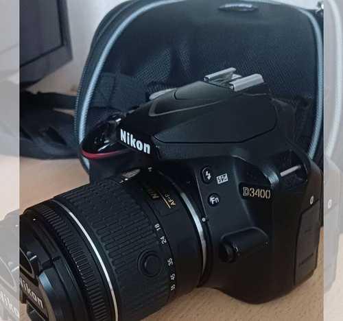 Зеркальный фотоаппарат nikon d3400 с обьективом