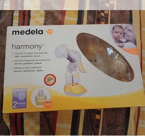 Молокоотсос medela ручной