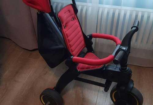Детский велосипед с ручкой doona