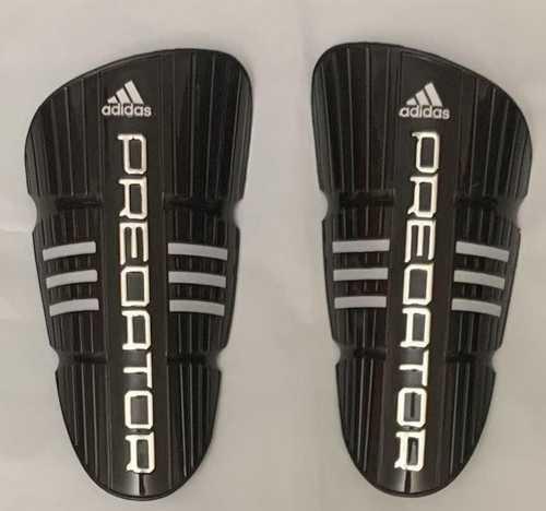 Детские футбольные щитки Adidas Predator