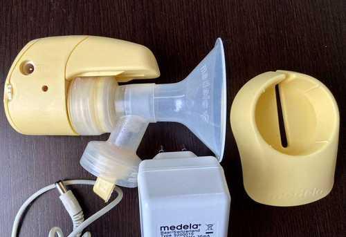 Молокоотсос medela электрический