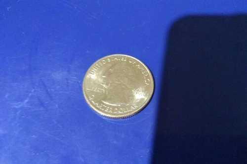 Монета в 25 центов или четверть доллара США
