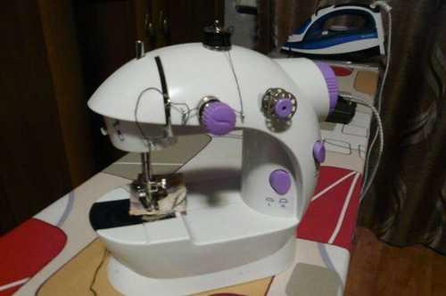 Портативная швейная машина