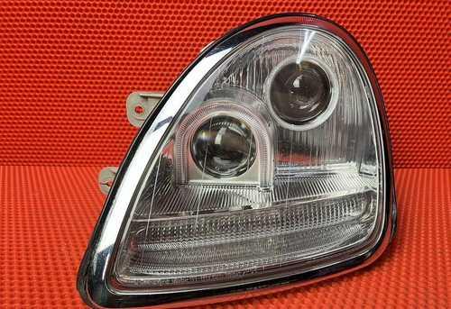 Фара левая SsangYong Chairman CM400 G23D; M 111.97