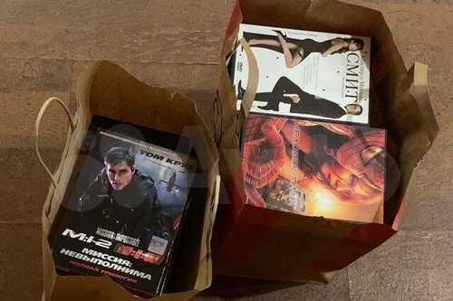 Два пакета с дисками DVD с фильмами и сериалами