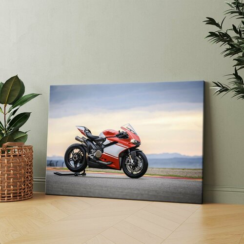 Картина на холсте (Красно-белый мотоцикл, припаркованный на дороге) 50x70 см. Интерьерная, на стену.